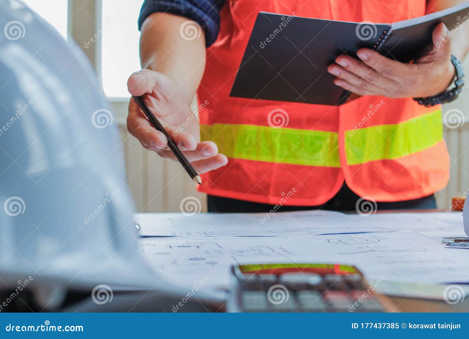 The Engineer is Giving Advice and Consulting with the Designer To Find ...