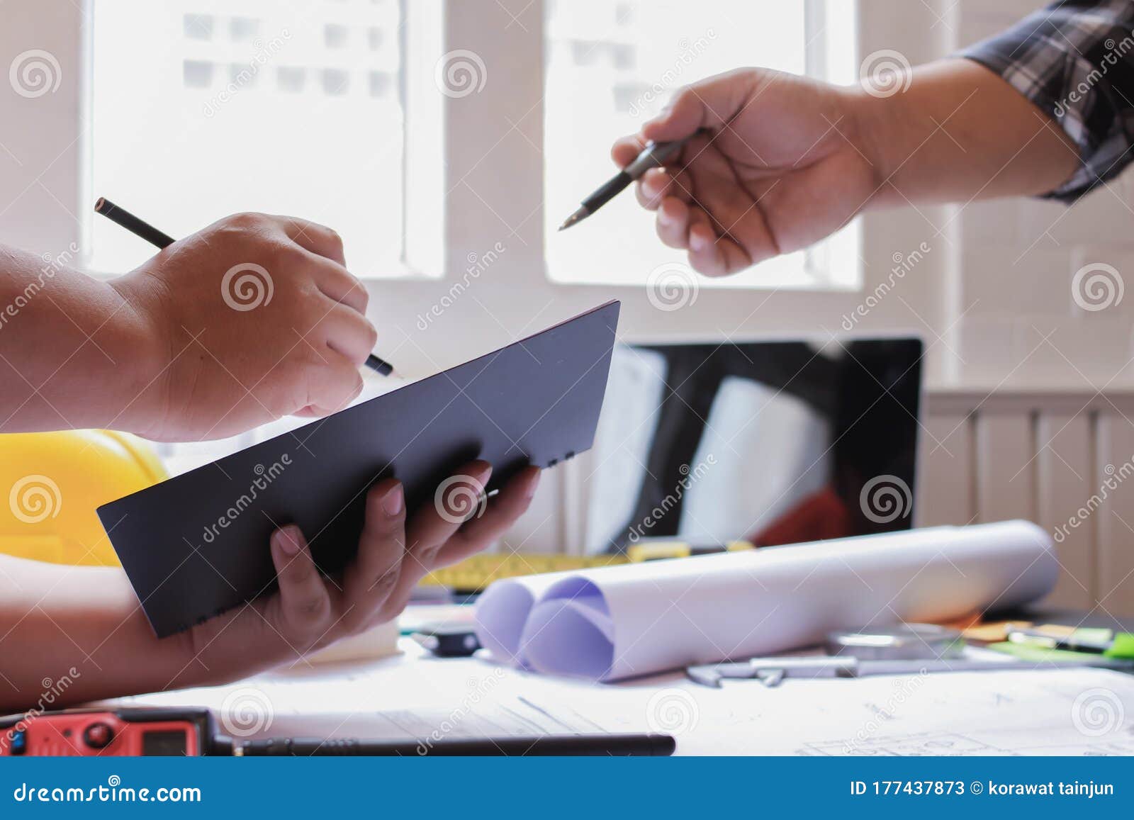 The Engineer is Giving Advice and Consulting with the Designer To Find ...