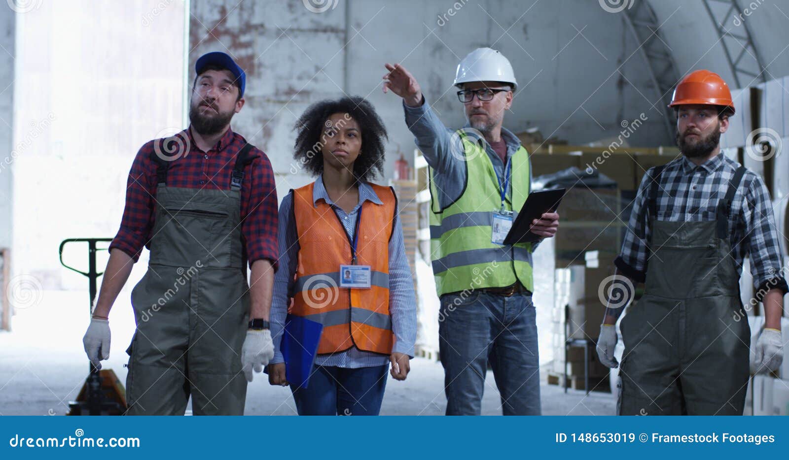 Engineer Giving Out Instructions in a Warehouse Stock Image - Image of ...
