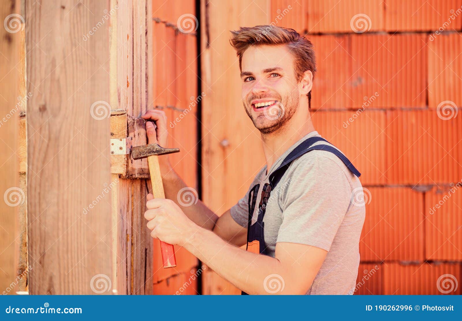 Engineer with Hammer Tool. Worker with Hammer Brick Wall Background ...