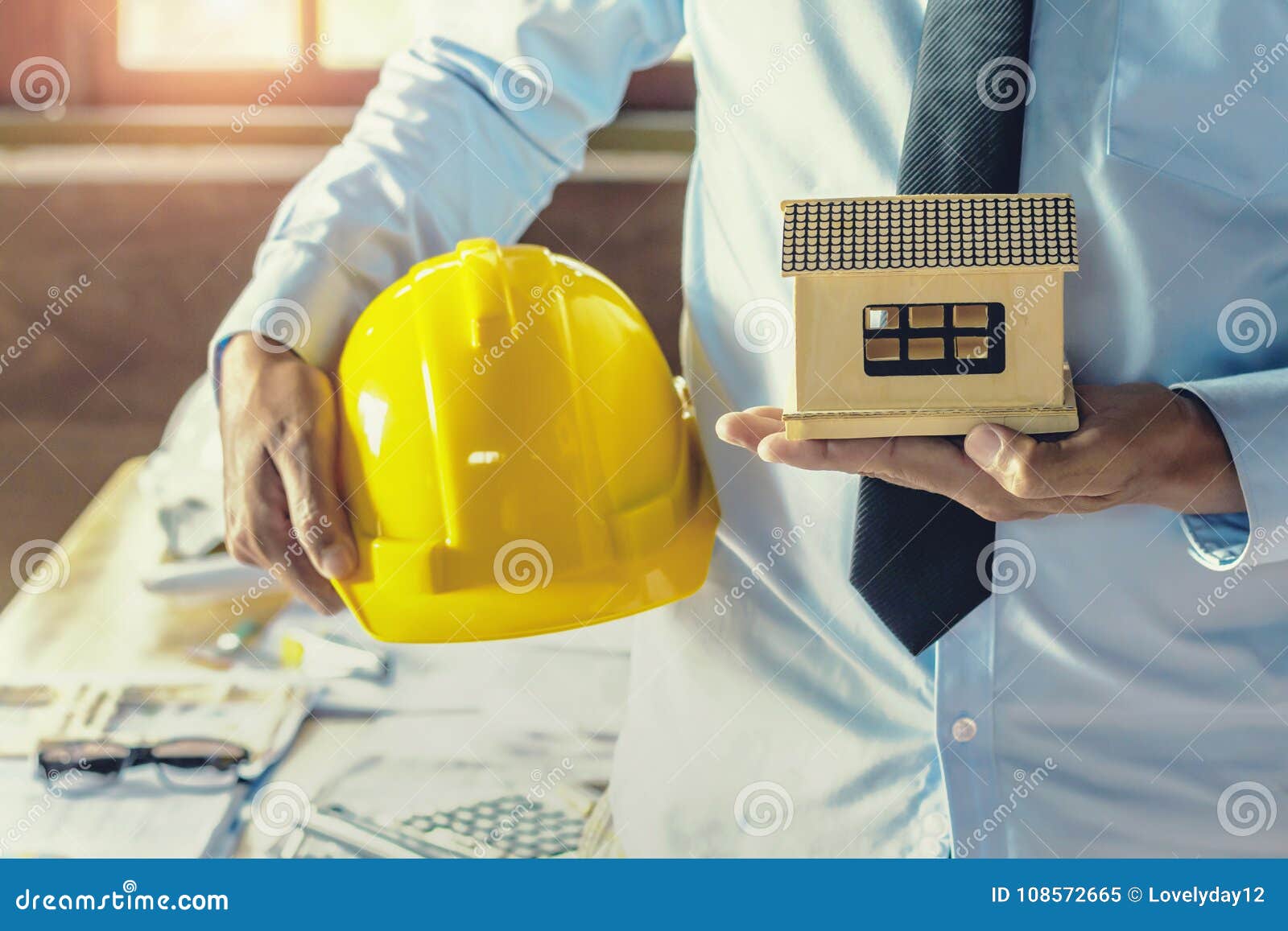 Engineer Hand Holding Helmet and Model Stock Image - Image of human ...