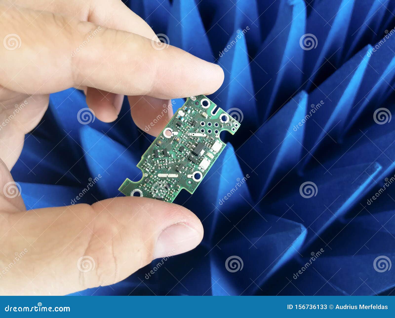 Engineer Hand Holding PCB in Front of EMC Absorbers Stock Image - Image ...