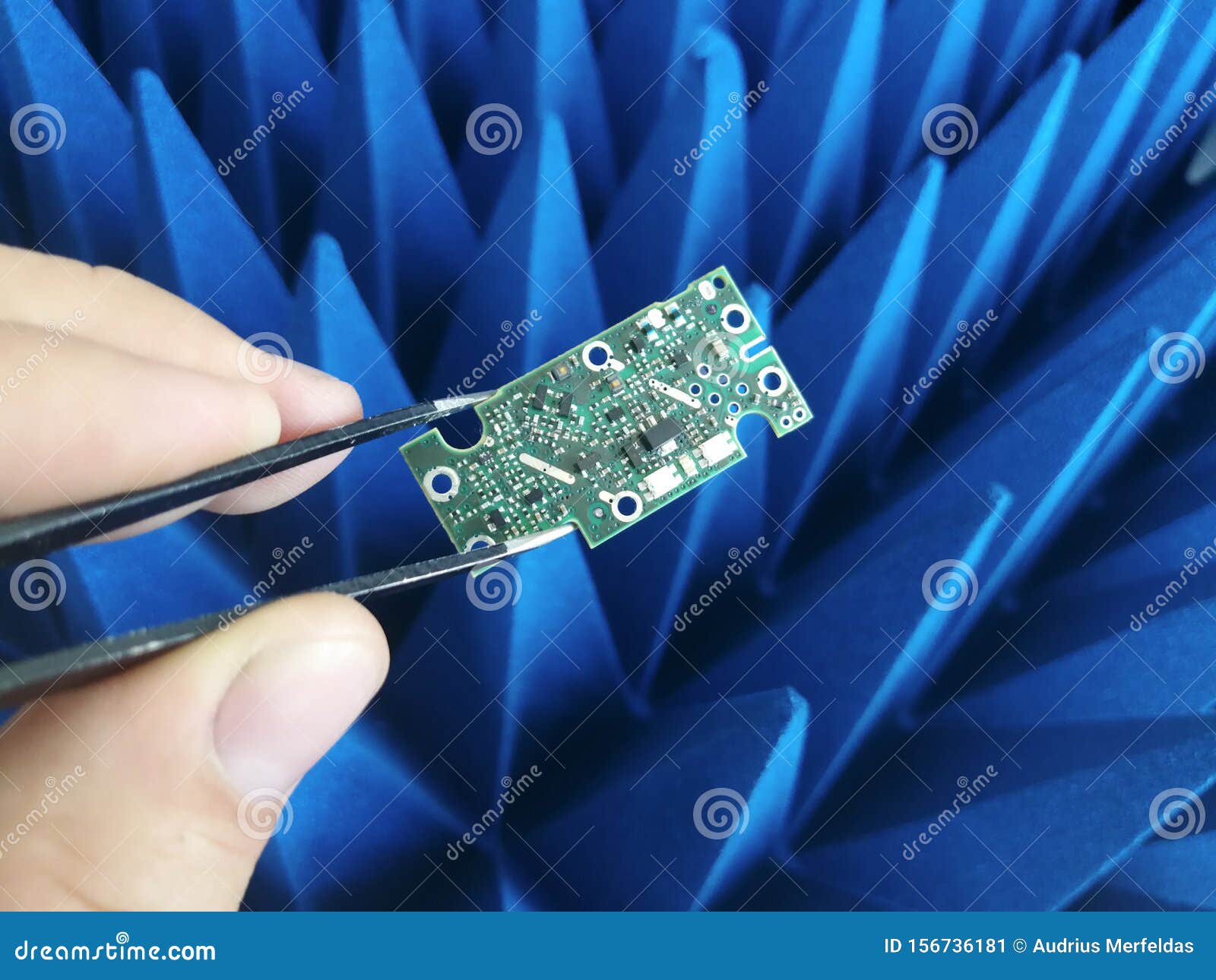 Engineer Hand Holding PCB in Front of EMC Absorbers Stock Image - Image ...