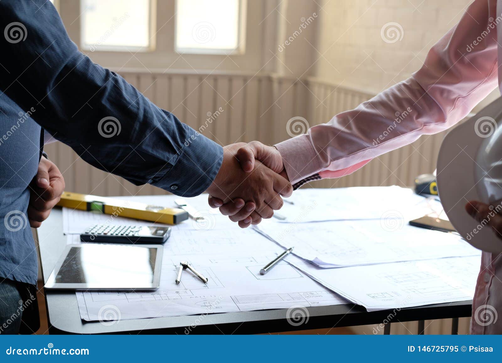 Engineer Handshaking. Architect Shaking Hands for Building Construction ...