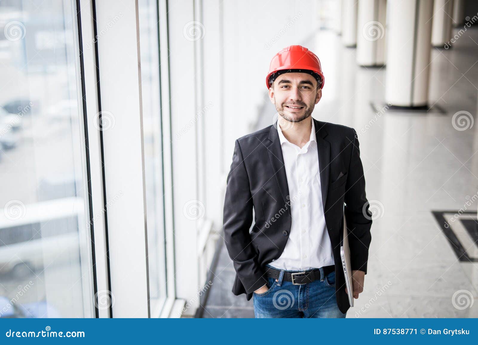 Engineer in Hardhat with Laptop Computer, Smiling at Camera. Stock ...