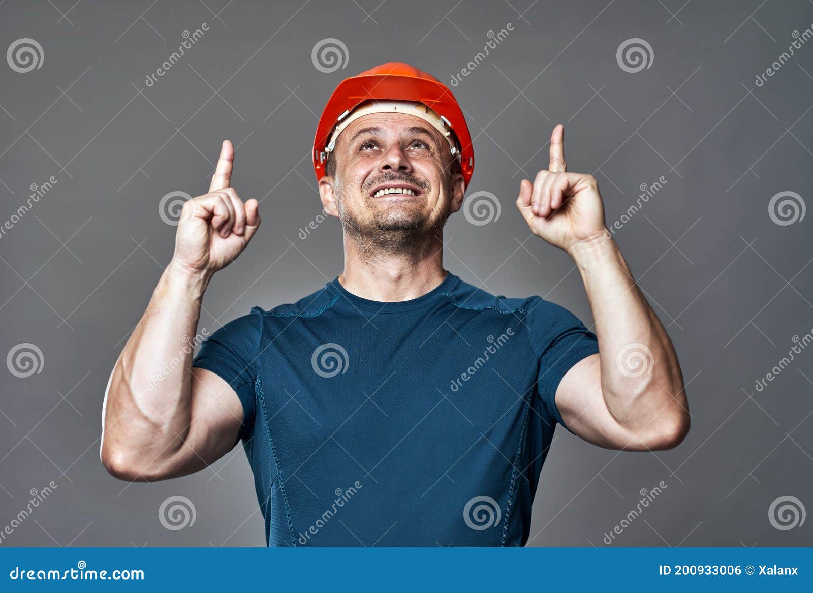 Engineer pointing upwards stock photo. Image of people - 200933006