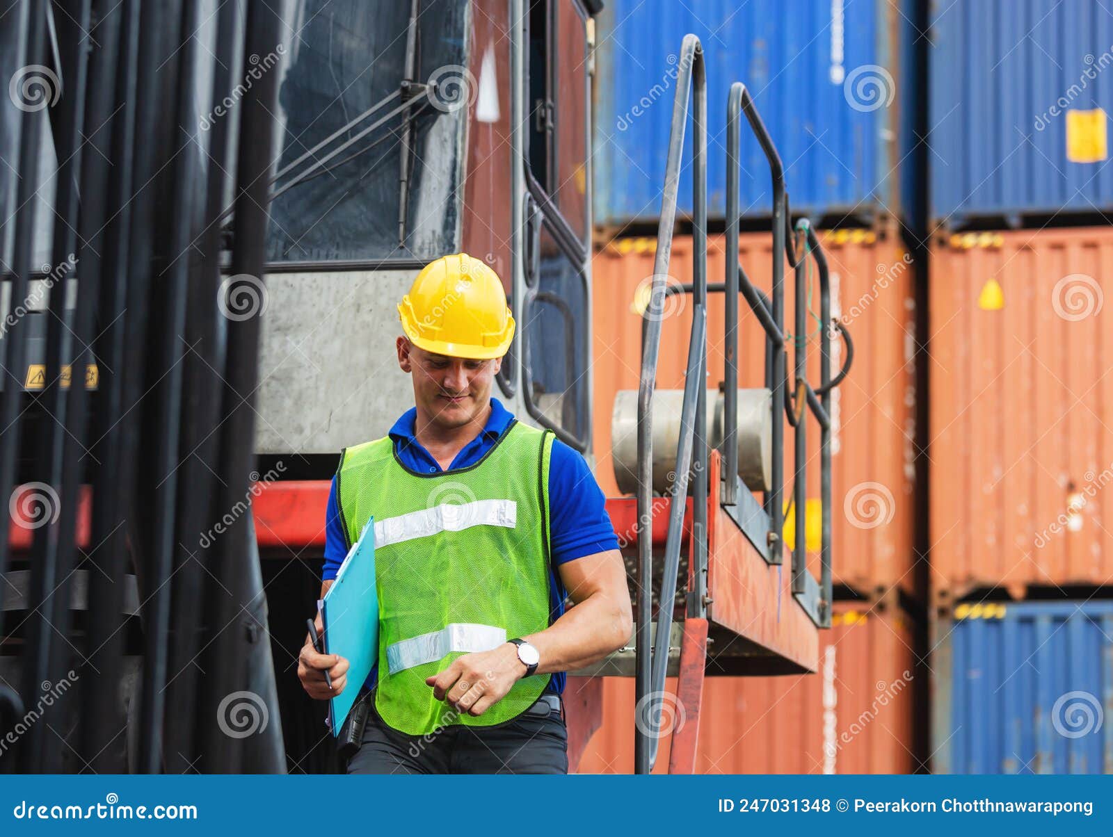 Engineer in Hardhat on Stacker Lifting Container Control Loading ...