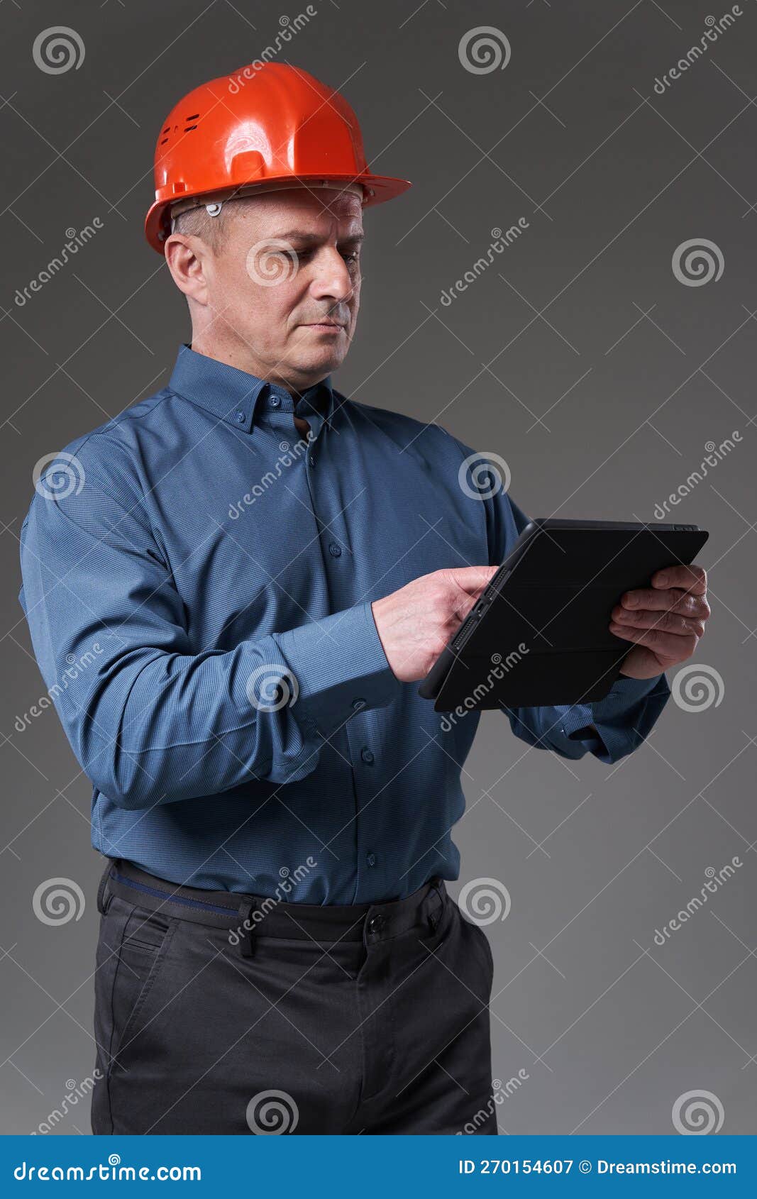 Engineer in Hardhat with a Tablet Stock Image - Image of industrial ...