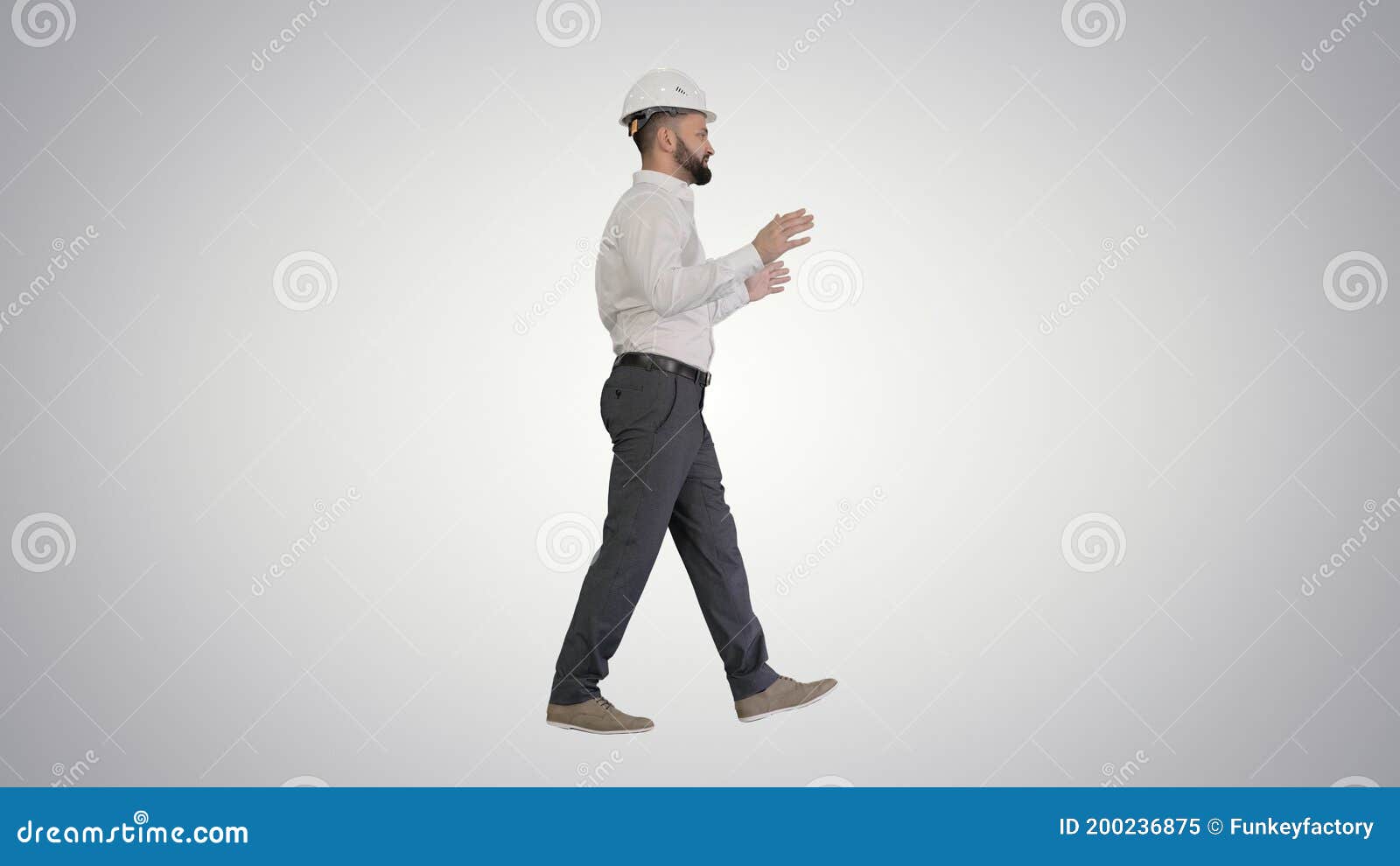 Engineer in Hardhat Walking and Explaining Something on Gradient Stock ...