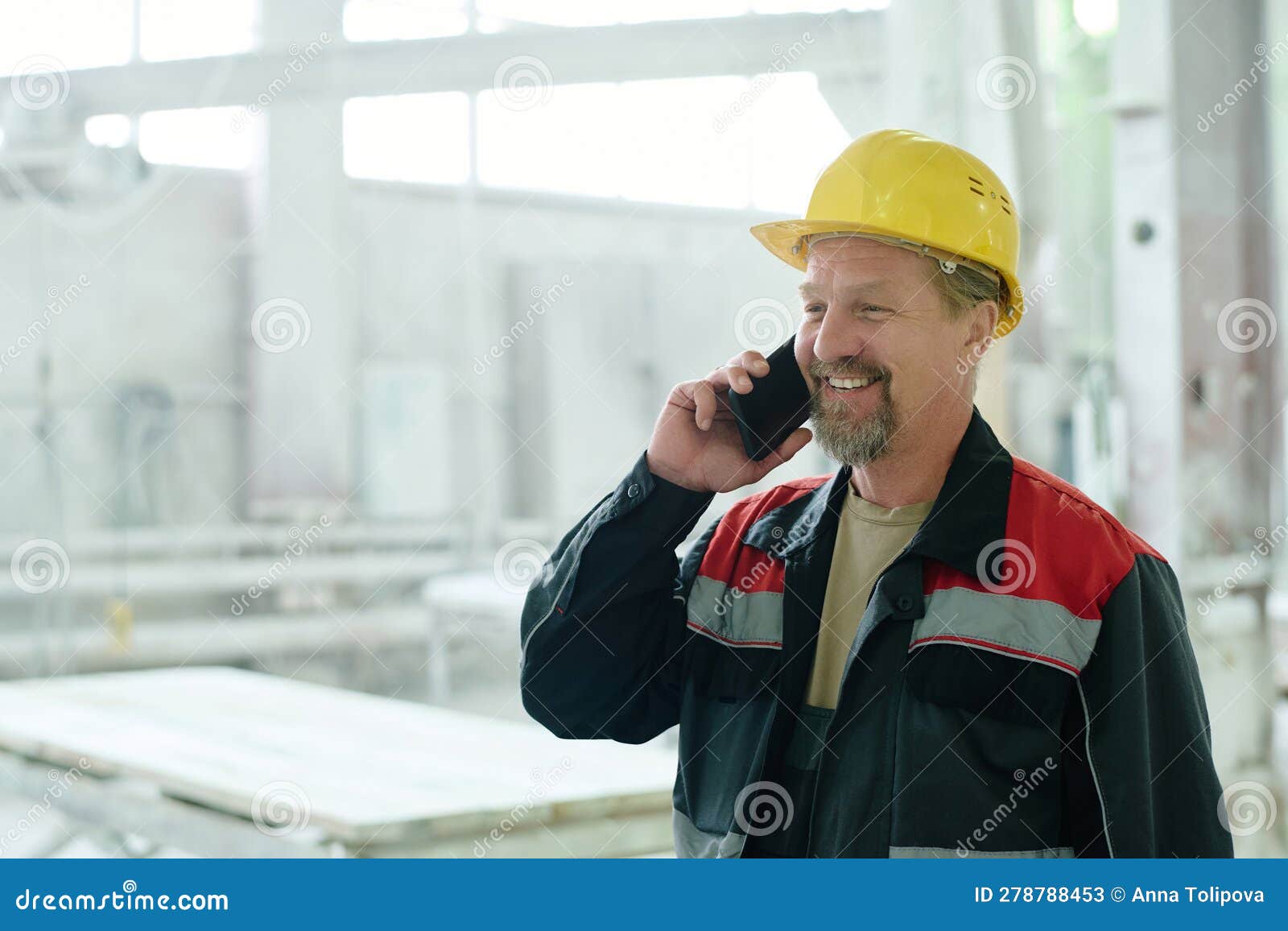 Engineer Having Conversation on Mobile Phone Stock Image - Image of ...