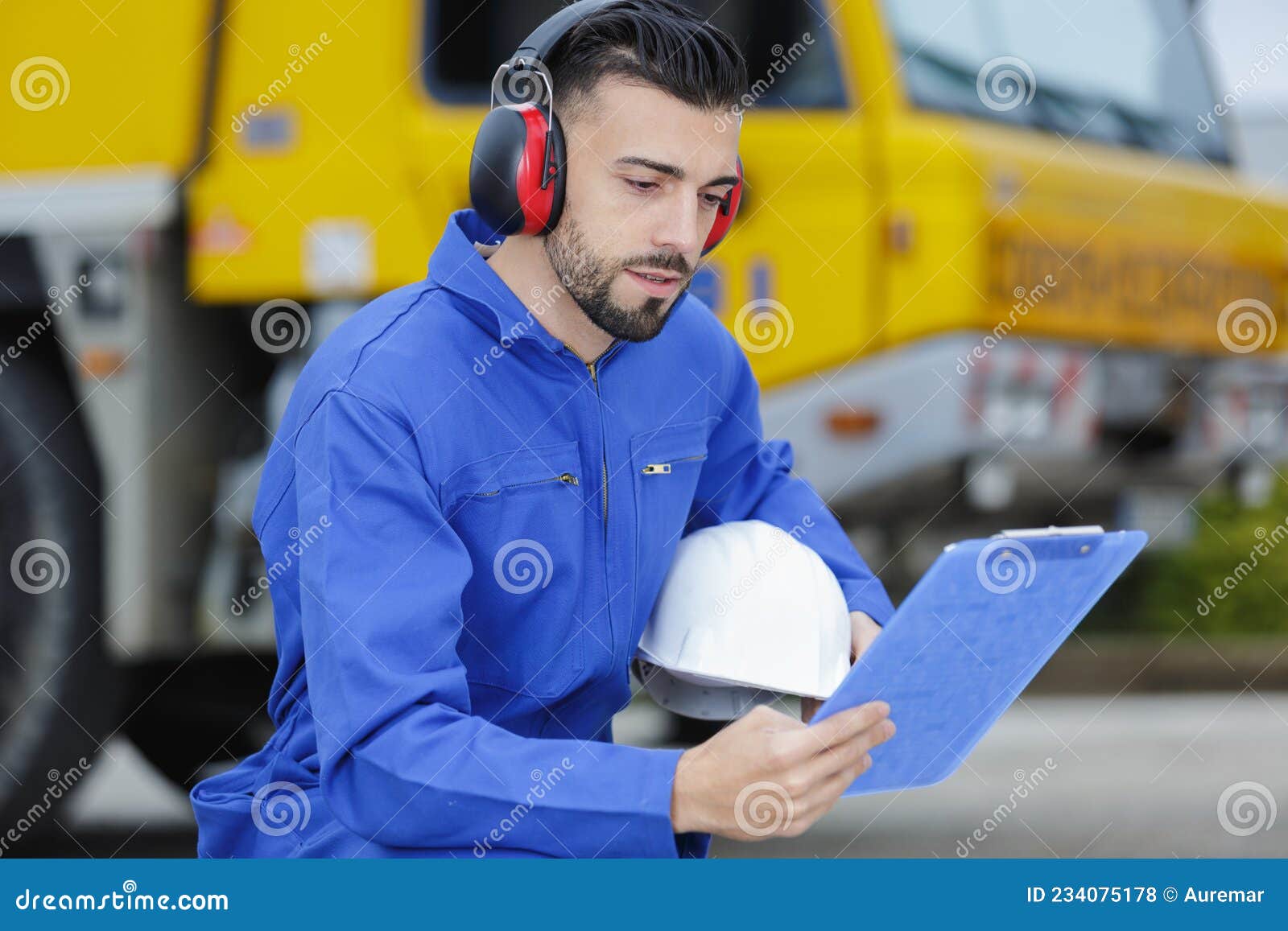 Engineer in Helmet Writing Something Stock Photo - Image of person ...