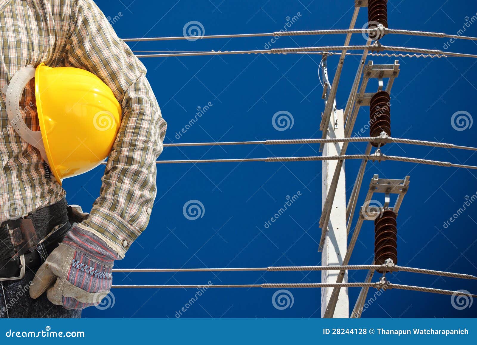 Engineer with High Voltage Electricity Pole in Blue Sky Stock Photo ...