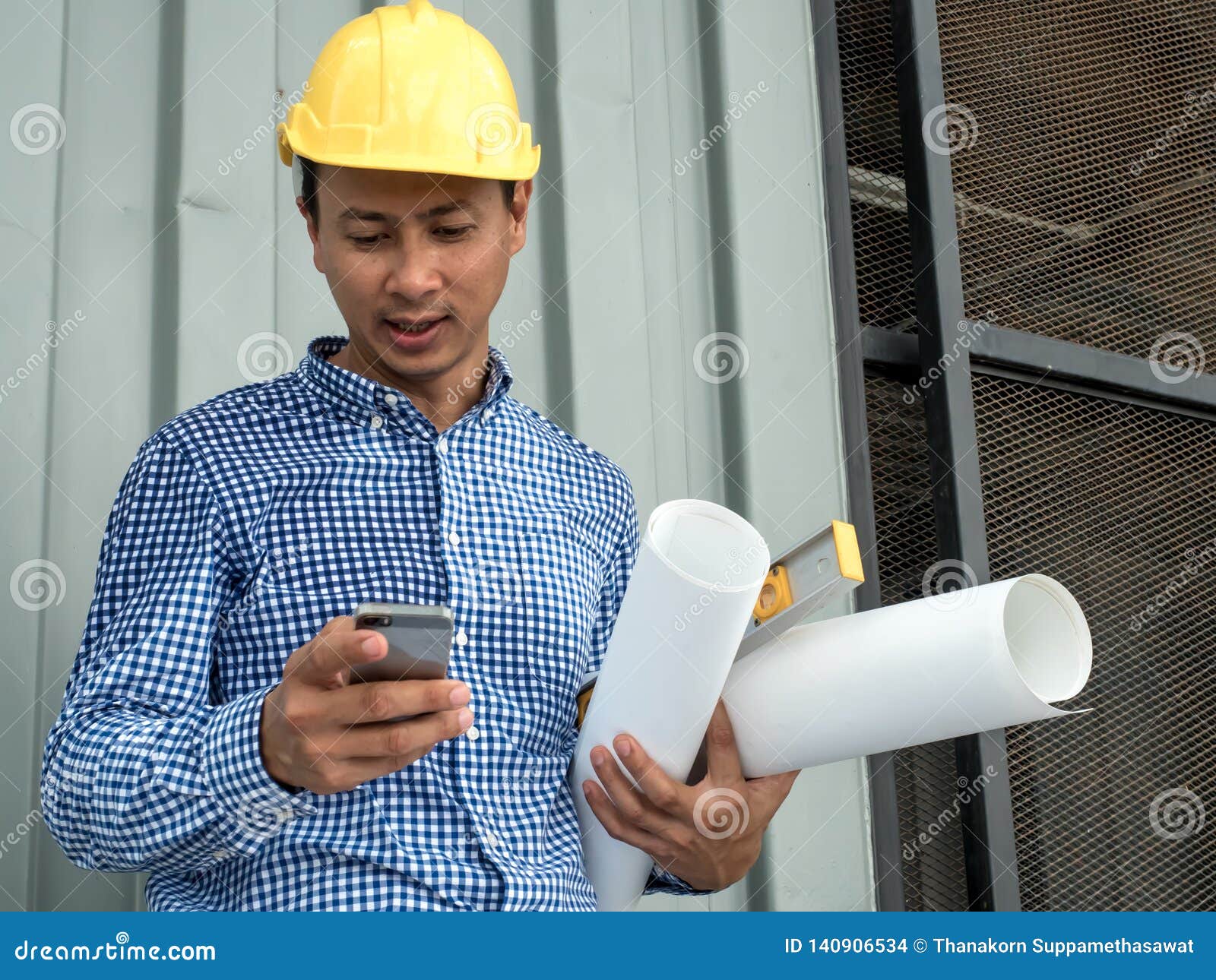 Engineer Hold Blueprint Paper Construction Drawing Plan and Holding ...