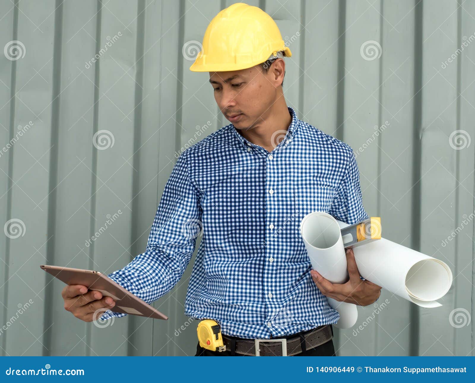 Engineer Hold Blueprint Paper Construction Drawing Plan and Holding ...