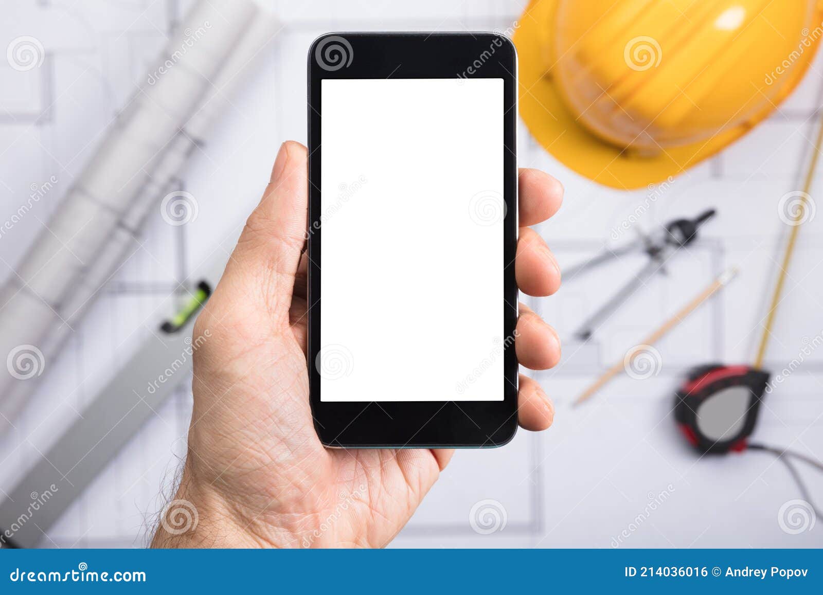 An Engineer Holding Cell Phone Stock Photo - Image of connection ...
