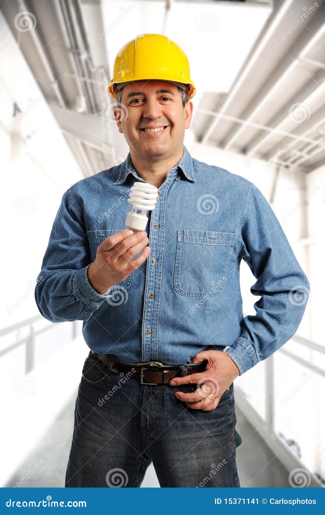 Engineer Holding an Electrical Bulb Stock Image - Image of pipes ...