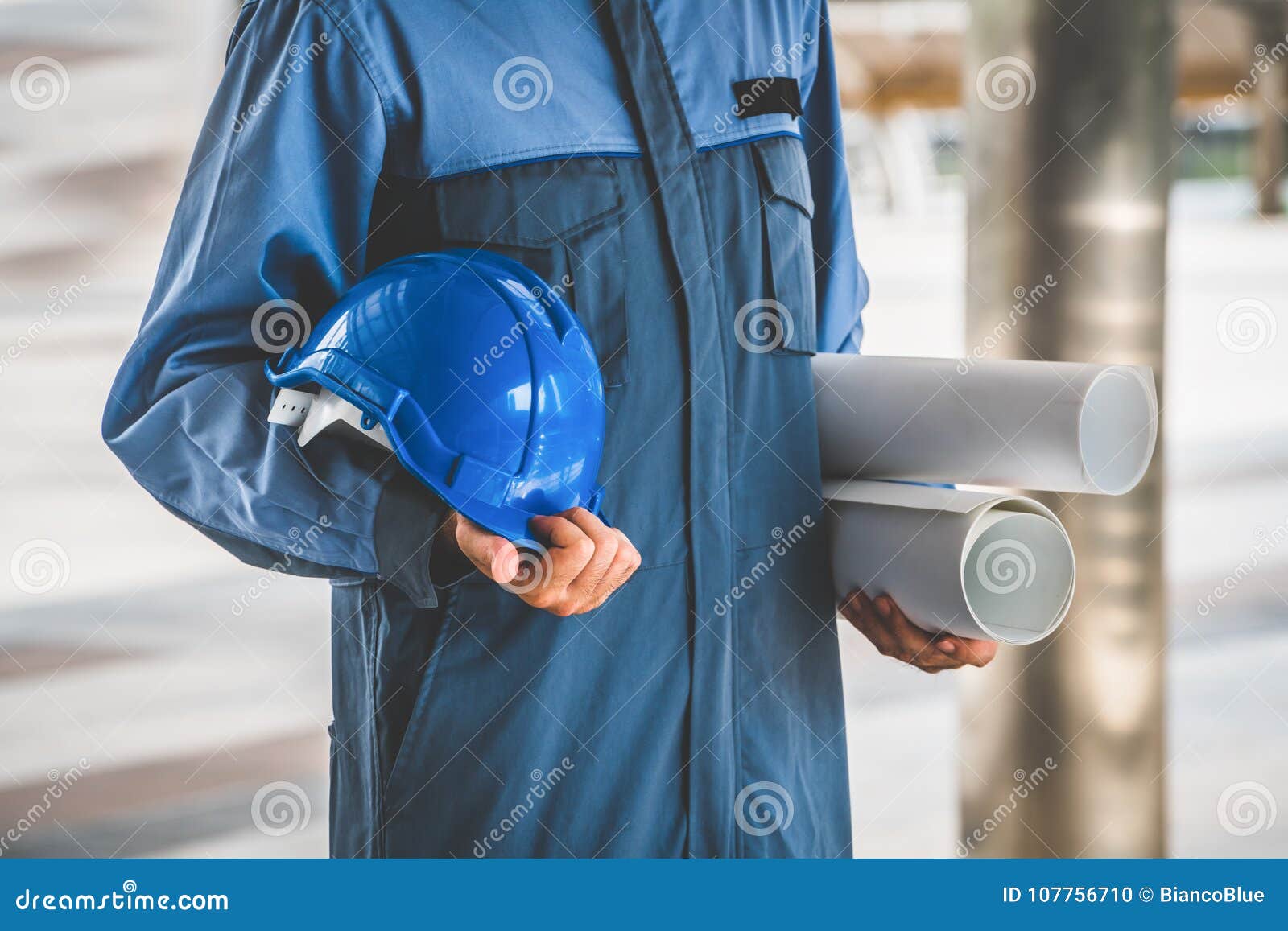Engineer Holding Hard Hat and Blueprint Stock Photo - Image of builder ...