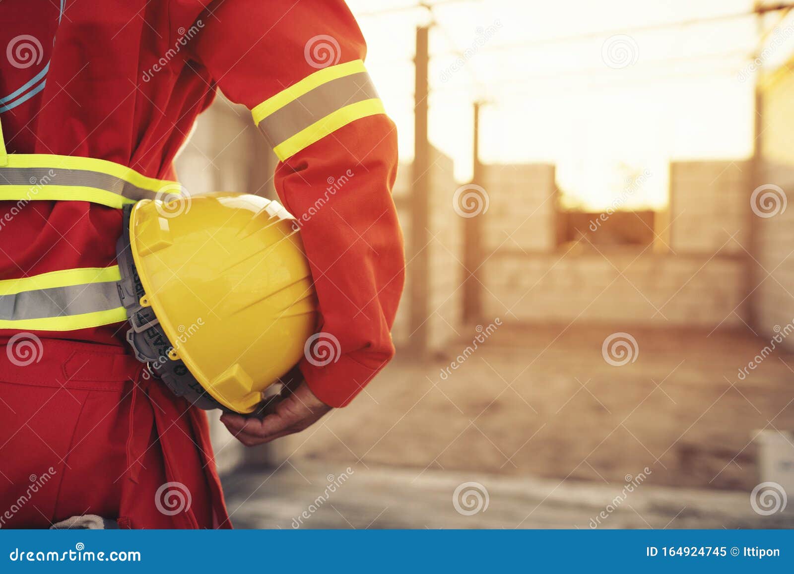Engineer Holding Helmet at Construction Site Stock Image - Image of ...