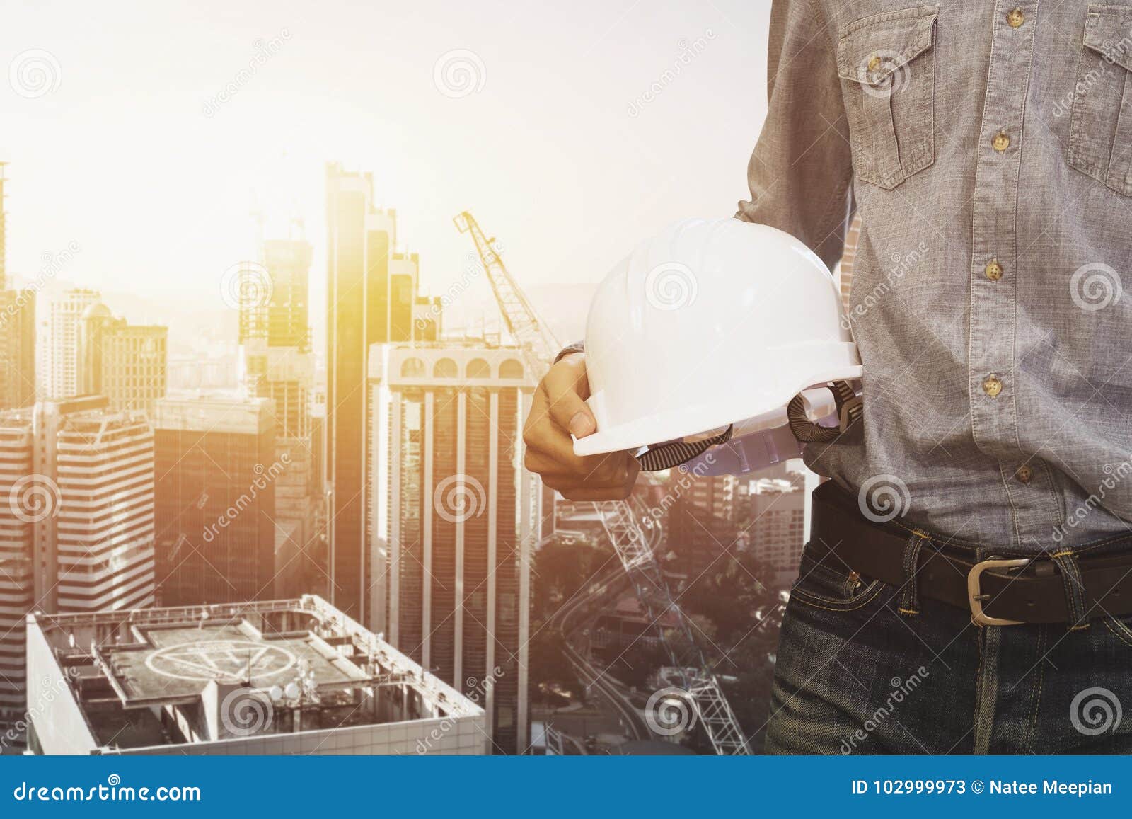 Engineer Holding Helmet for Workers Security on Background of Ne Stock ...