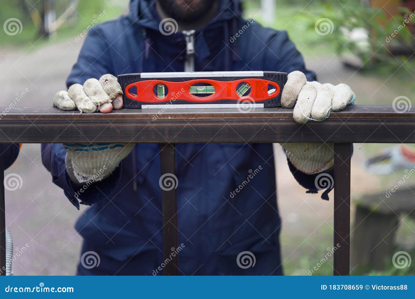 Engineer Holding a Level Ruler Stock Image - Image of liquid, outdoor ...