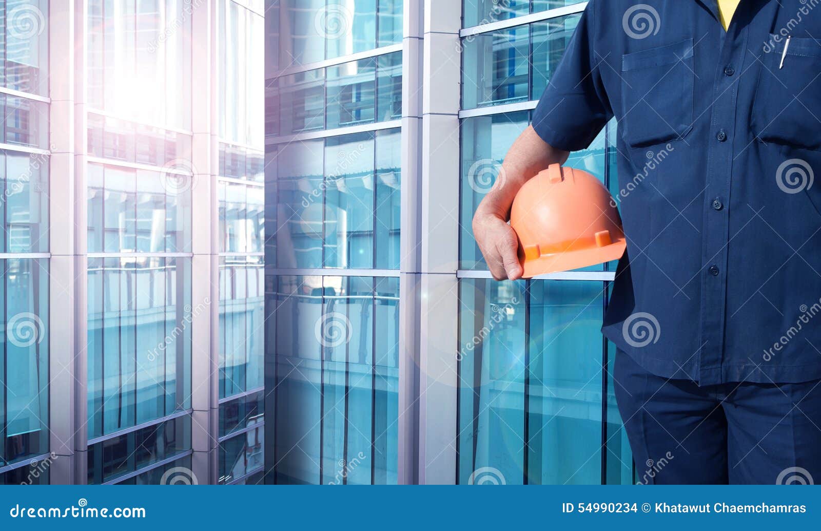 Engineer Holding Orange Helmet for Workers Security Stock Photo - Image ...