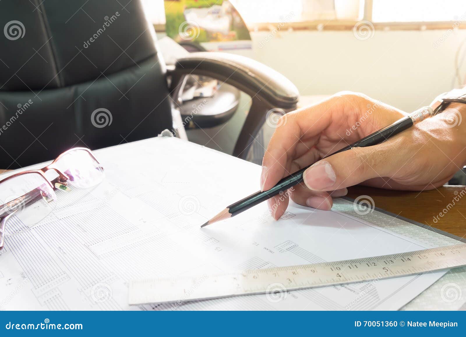 Engineer Holding a Pencil To Check Diagram for Fiber Optic Stock Photo ...