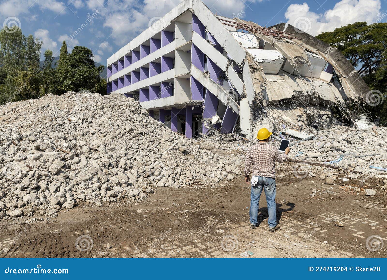 Engineer Holding Tablet is Checking for Destruction, Demolishing ...