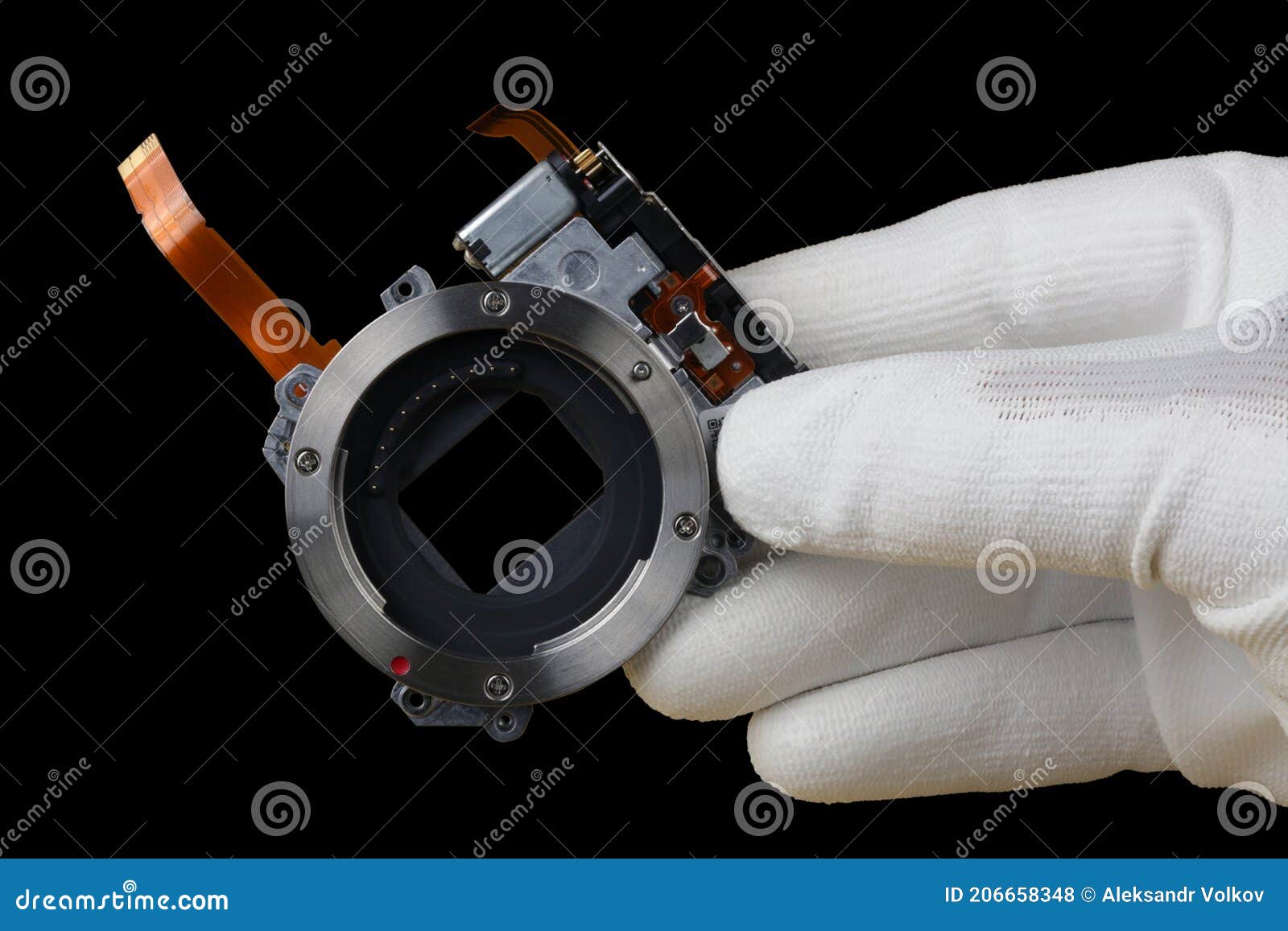 A Engineer Holds in Hand a Modern Shutter Unit for a Digital Photo ...