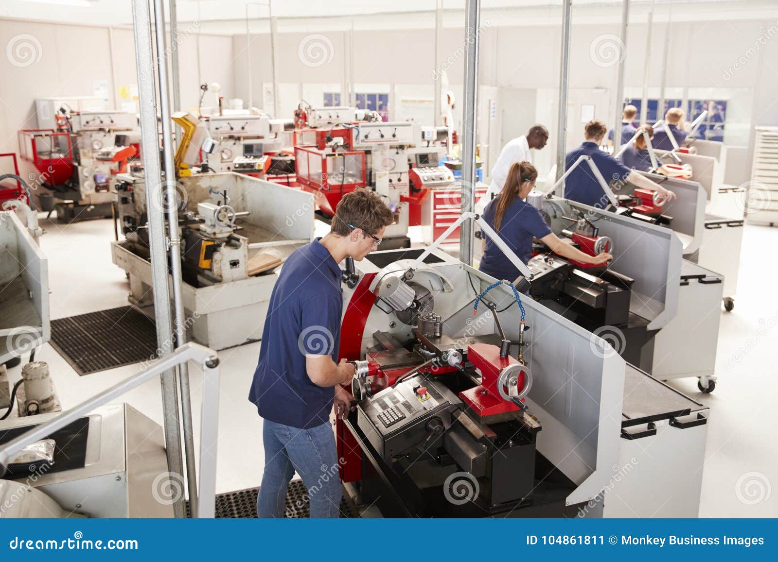 Engineer Inspecting Apprentices at Their Workstations Stock Image ...