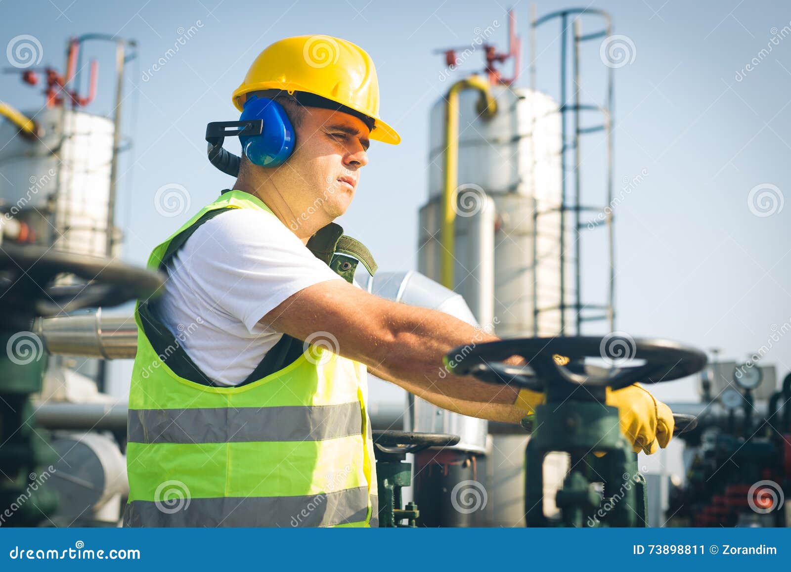 Engineer Inspecting a Valve Stock Image - Image of coveralls, manual ...