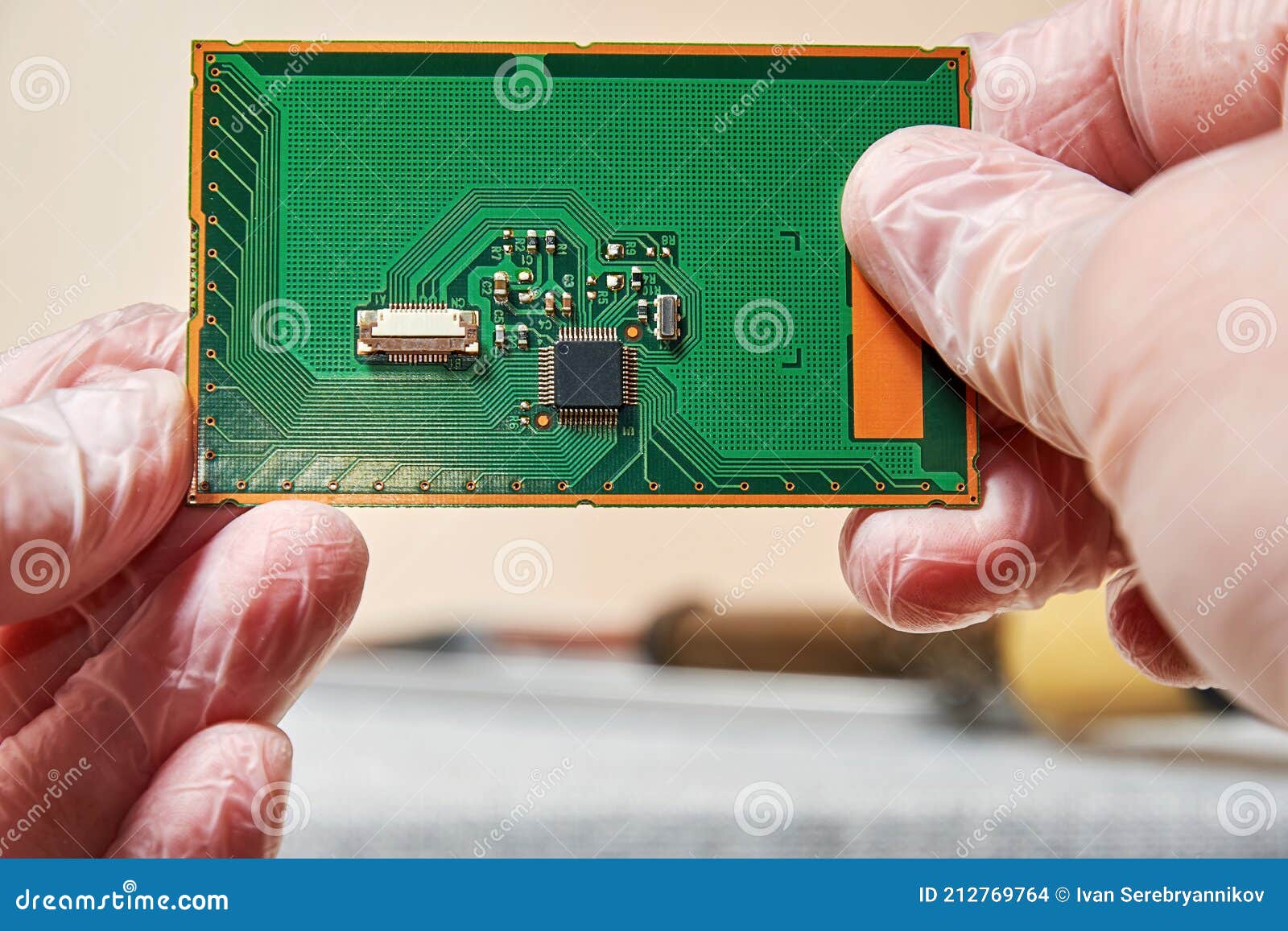 An Engineer Keeps and Examines the PCB with a Microchip in Tech ...