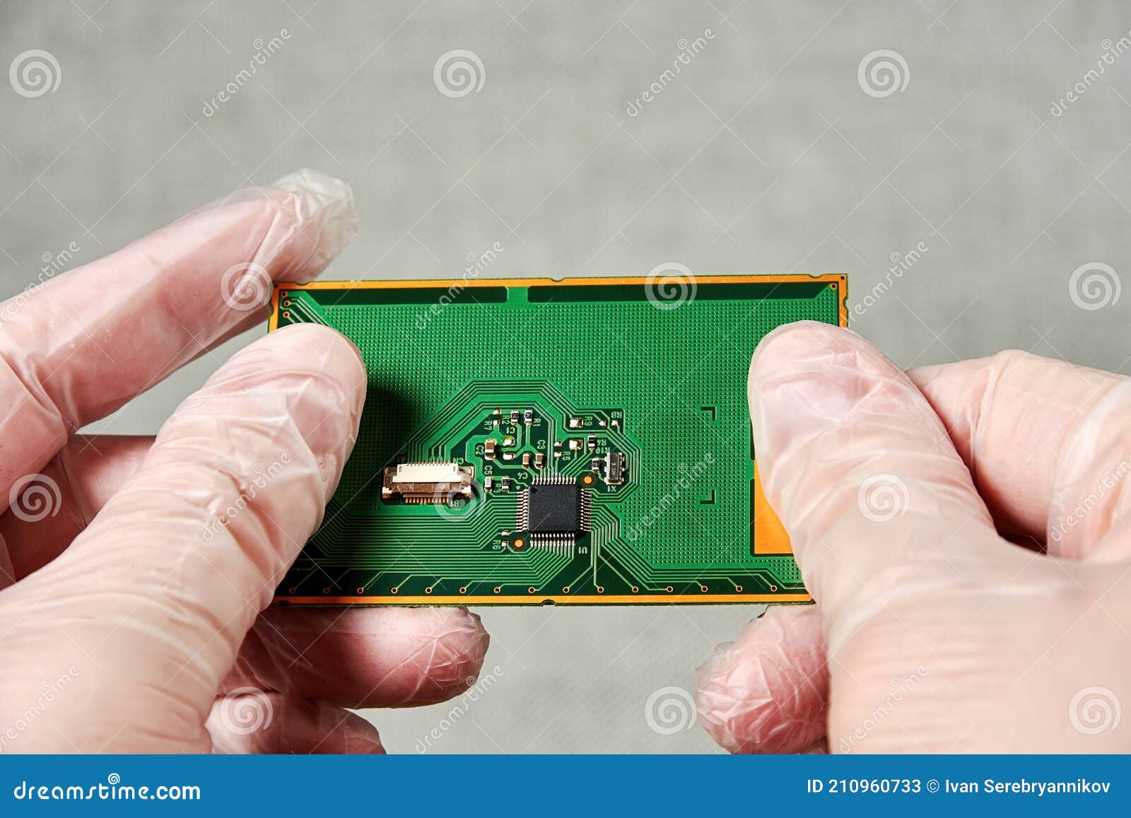 An Engineer Keeps PCB with a Microchip in His Hands after Development ...