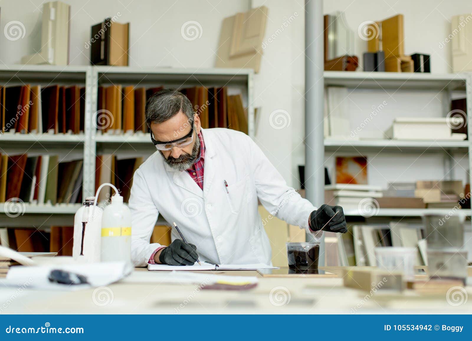 Engineer in the Laboratory Examines Ceramic Tiles Stock Photo - Image ...