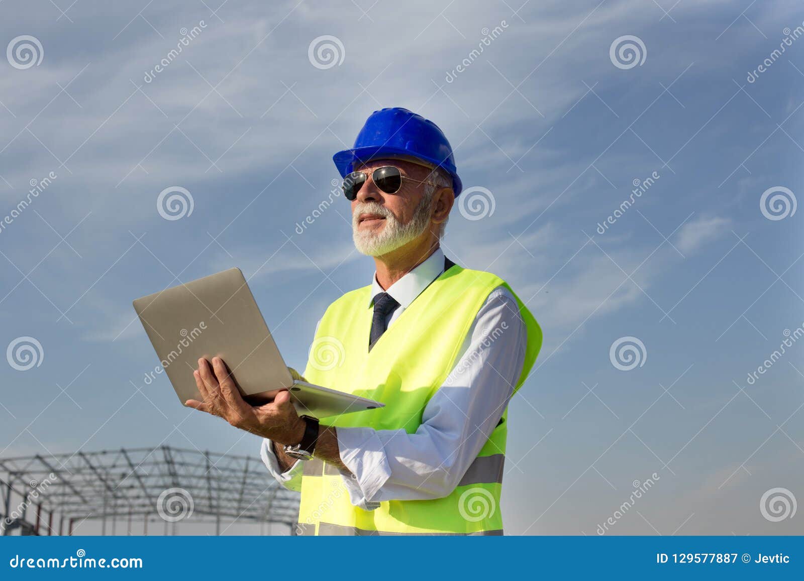 Engineer with Laptop at Building Site Stock Image - Image of helmet ...