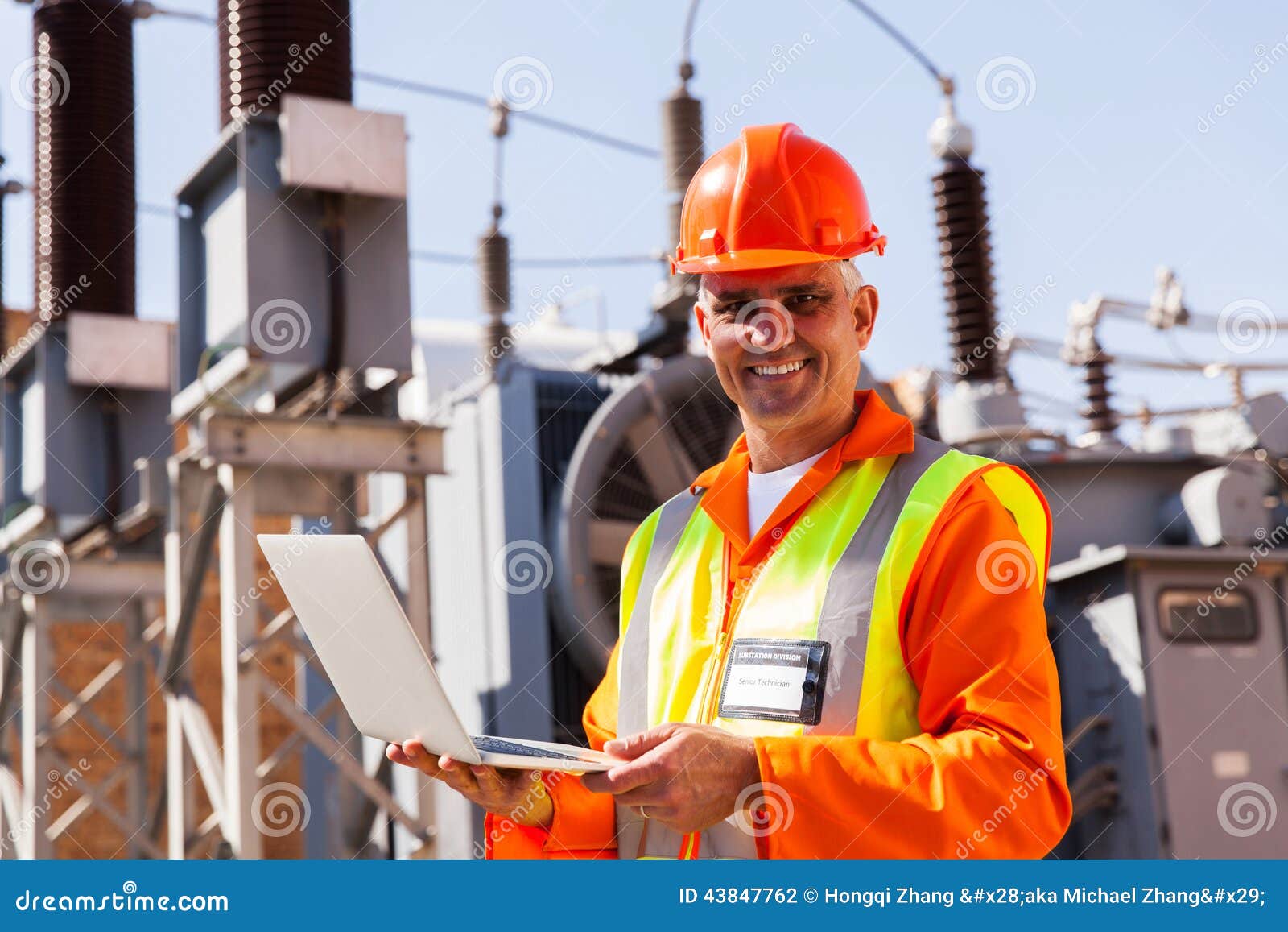 Engineer with laptop stock photo. Image of helmet, plant - 43847762