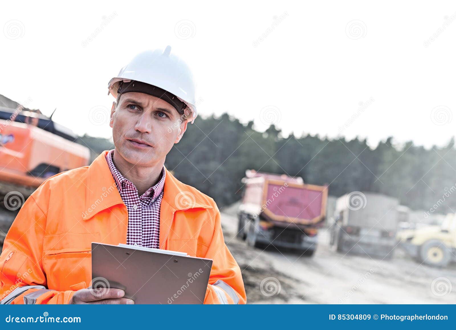Engineer In Clear Room In White Gloves And Suit Holding A Silicon Wafer ...