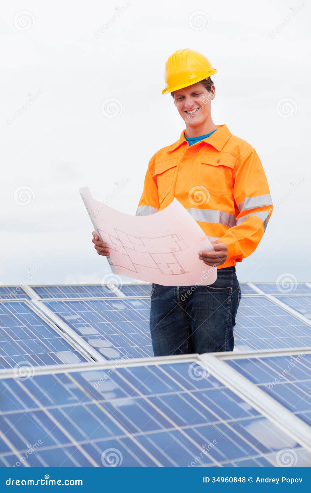 Engineer Looking at Blueprint Stock Photo - Image of plan, holding ...