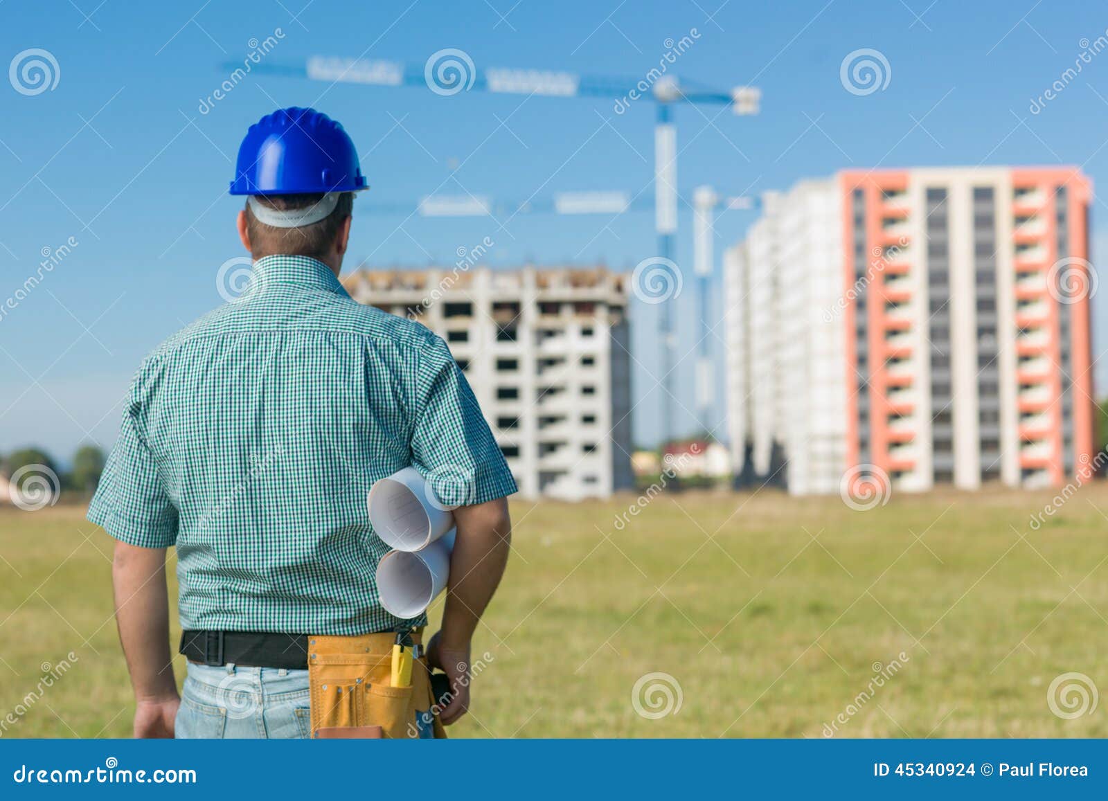 Engineer Looking at Building in Construction Stock Photo - Image of ...