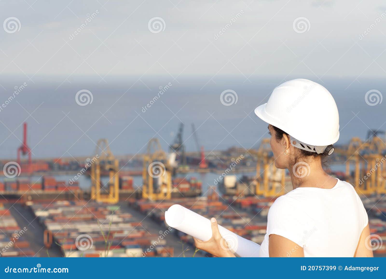 Engineer looks at port stock image. Image of shipment - 20757399