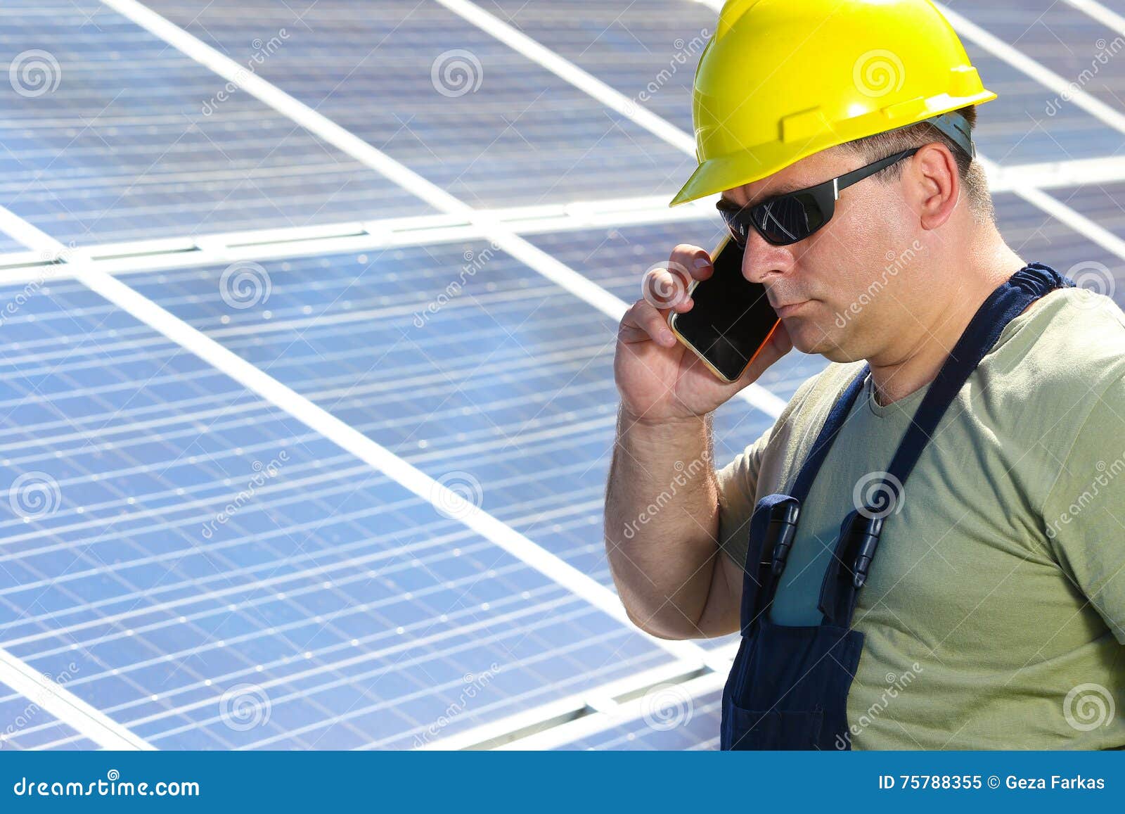Engineer is Make Call with a Mobile Phone in Solar Power Plant Stock ...