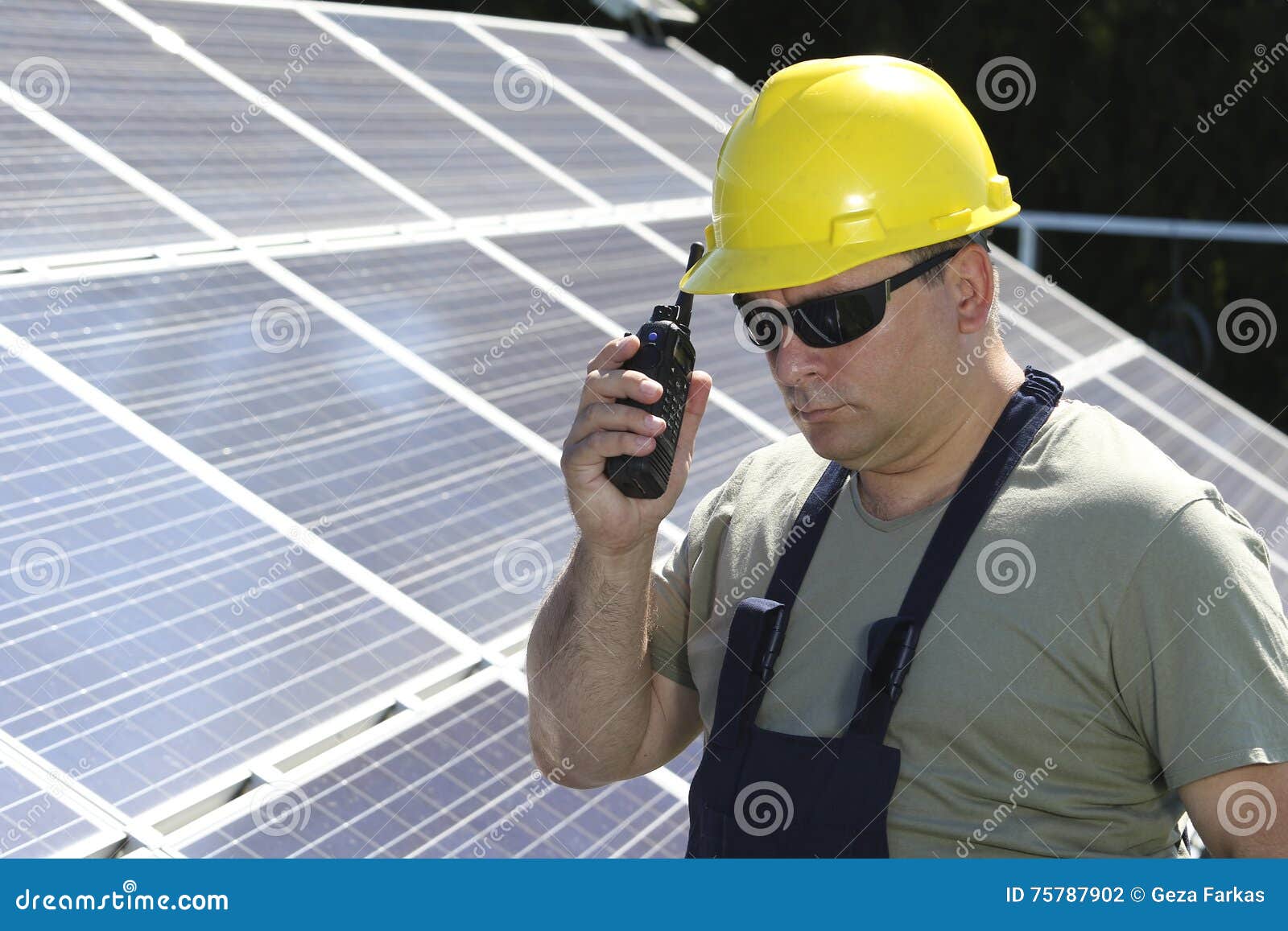 Engineer is Make Call with a Walkie Talkie in Solar Power Plant Stock ...