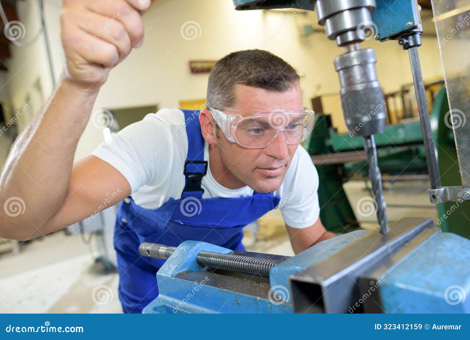 Engineer Making Hole in Metal with Bench Drill Stock Image - Image of ...