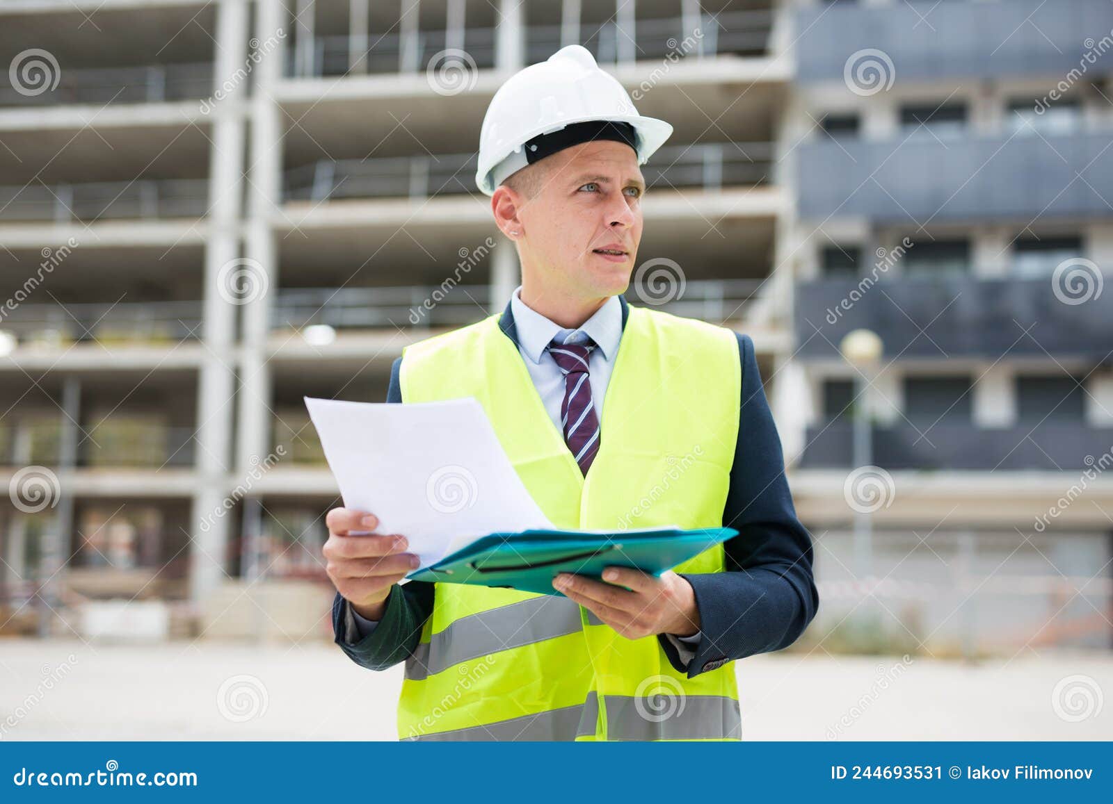 Engineer Man Analysing Project Documentation Outdoors Stock Image ...