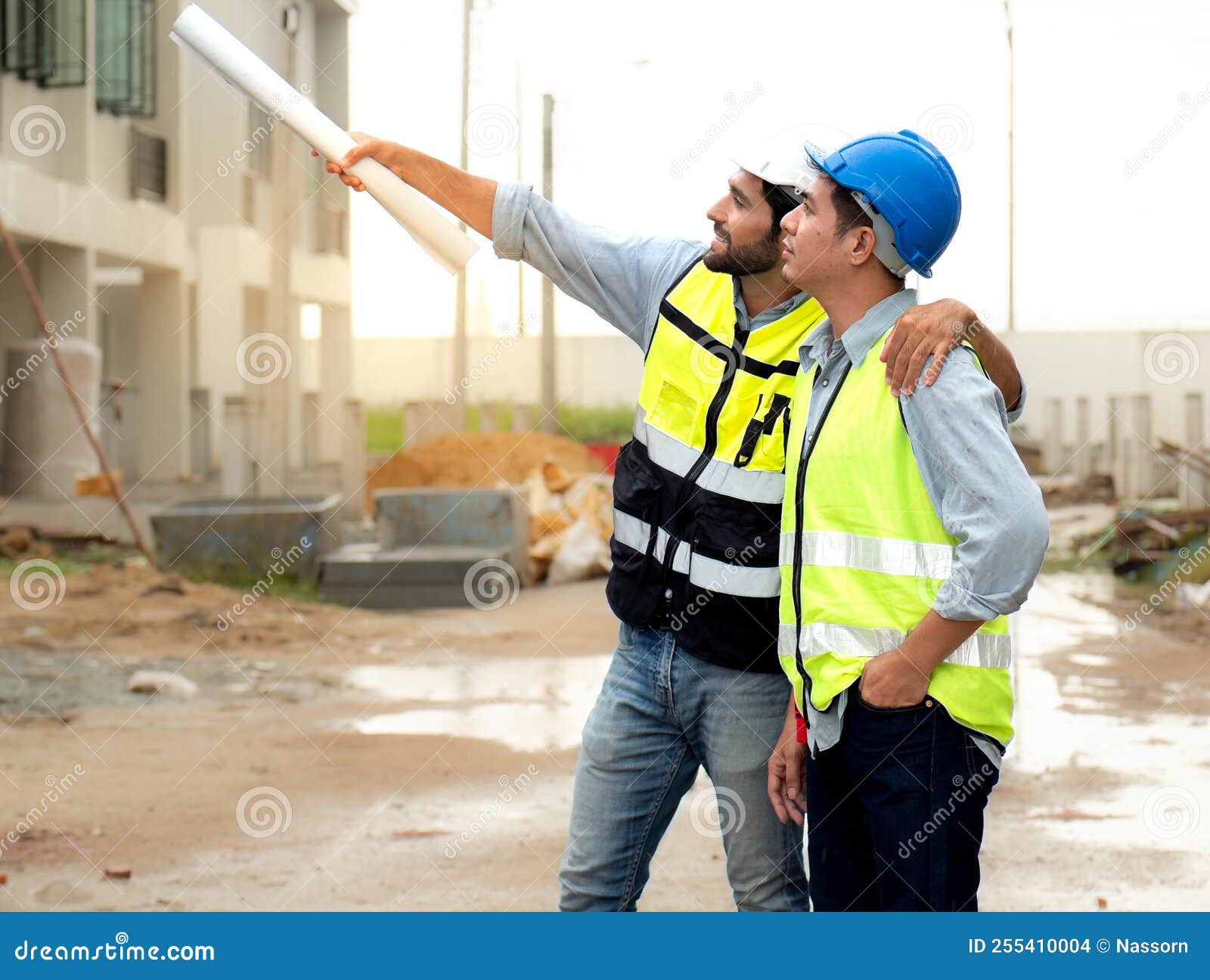 Engineer Man and Architect, Contractor Wear Safety Helmets Discuss ...