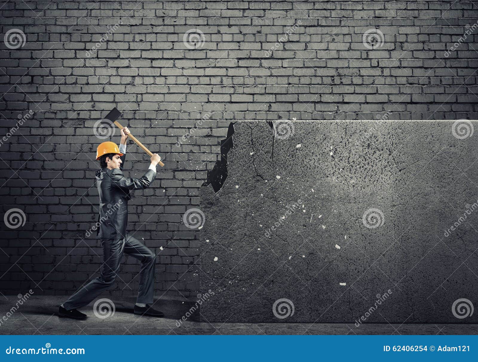 Engineer man break wall stock photo. Image of building - 62406254
