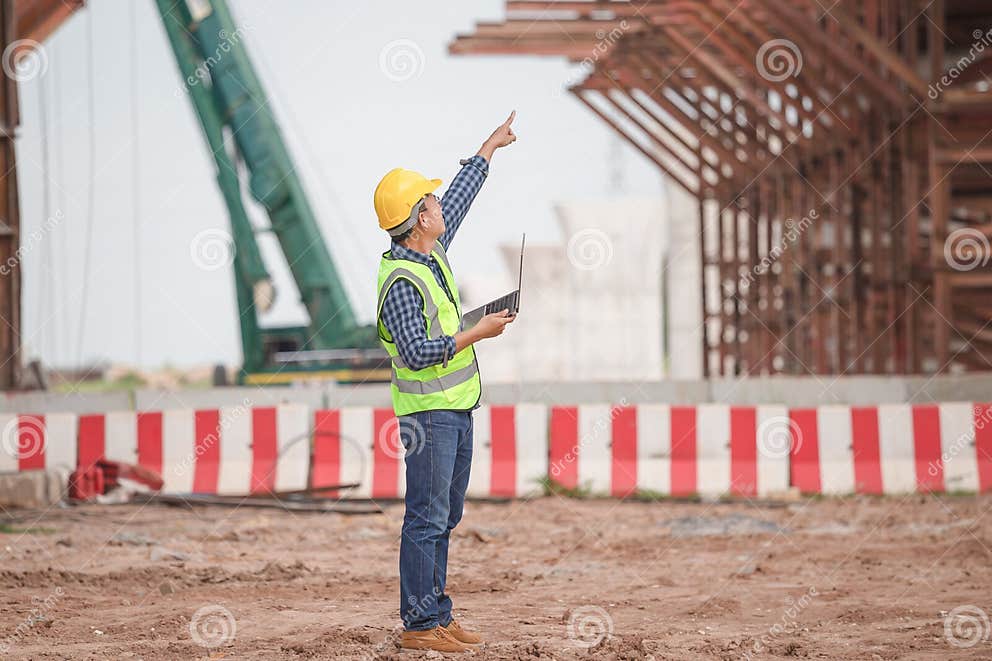 Engineer Man with Laptop at Infrastructure Construction Site, Foreman ...