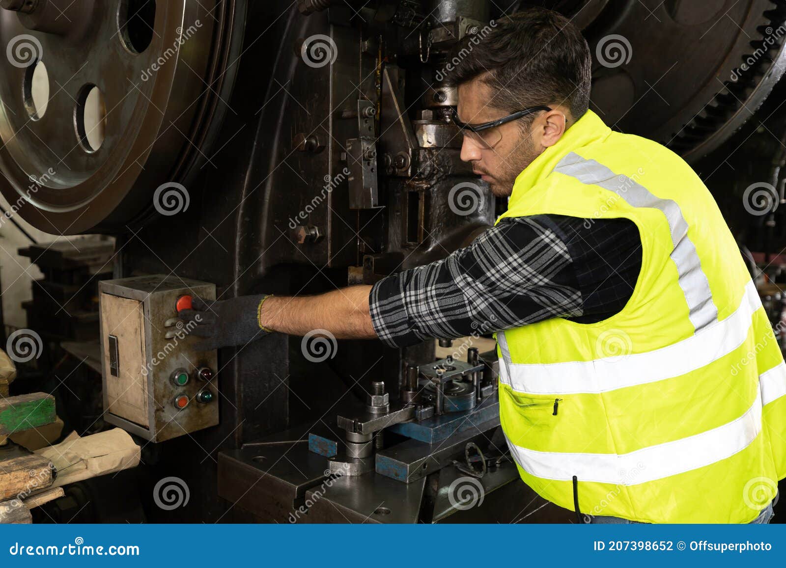 Engineer Man Pushing Button on Machine and Controlling Production Stock ...