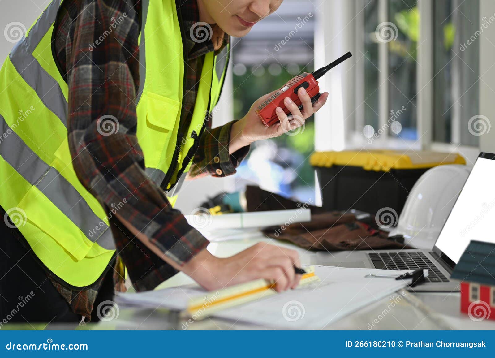 Engineer Man Standing Communicating with Walkie Talkie and Working with ...