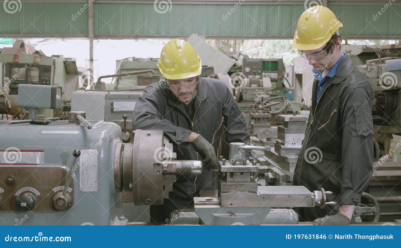 Engineer Man Training with Foreman for Apprentice Using Lathe ...