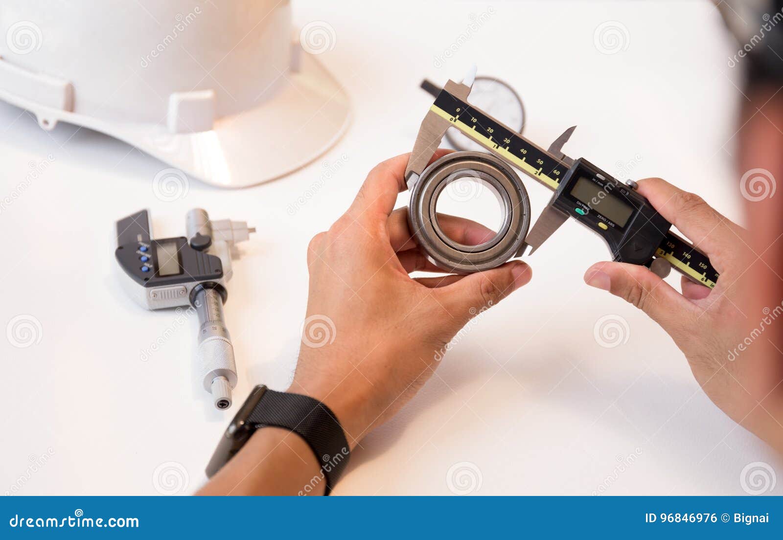 Engineer Man Using Vernier Caliper Measuring the Bearing Stock Photo ...